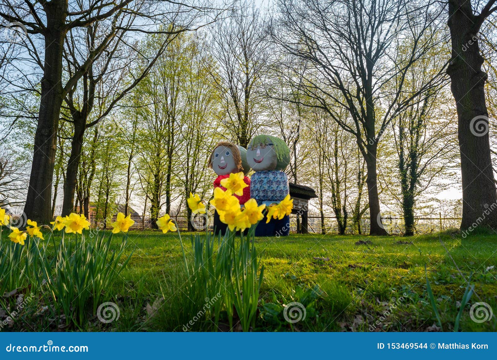Humans from Hay Bales Stand at the Roadside Stock Photo - Image of ...