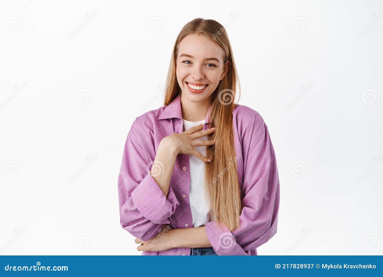 Humble Cute Blond Girl Looking Touched And Flattered Smiling Pleased
