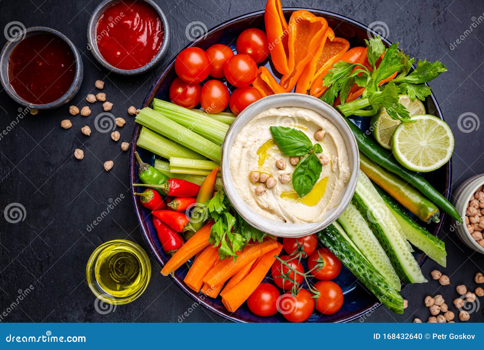 Hummus Platter with Assorted Snacks. Stock Photo - Image of crackers ...