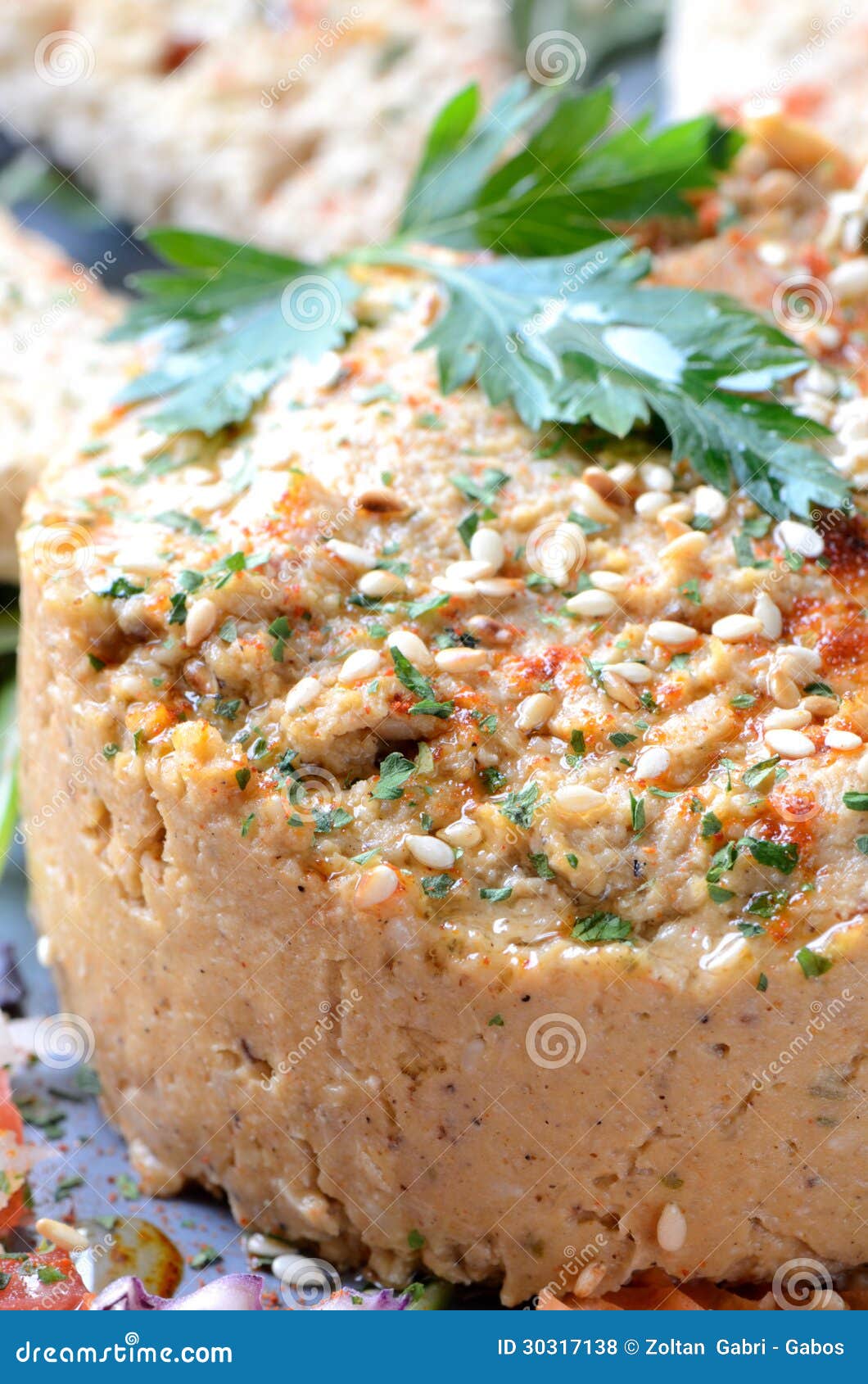 Hummus with sesame seeds stock photo. Image of middle - 30317138