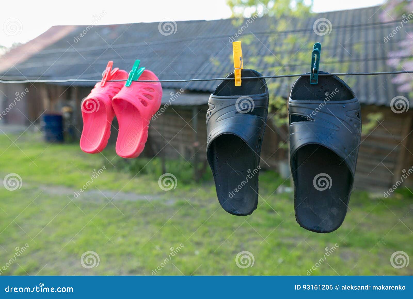 Humor. Rubber Slippers are Dried on the Clothesline Stock Photo - Image ...