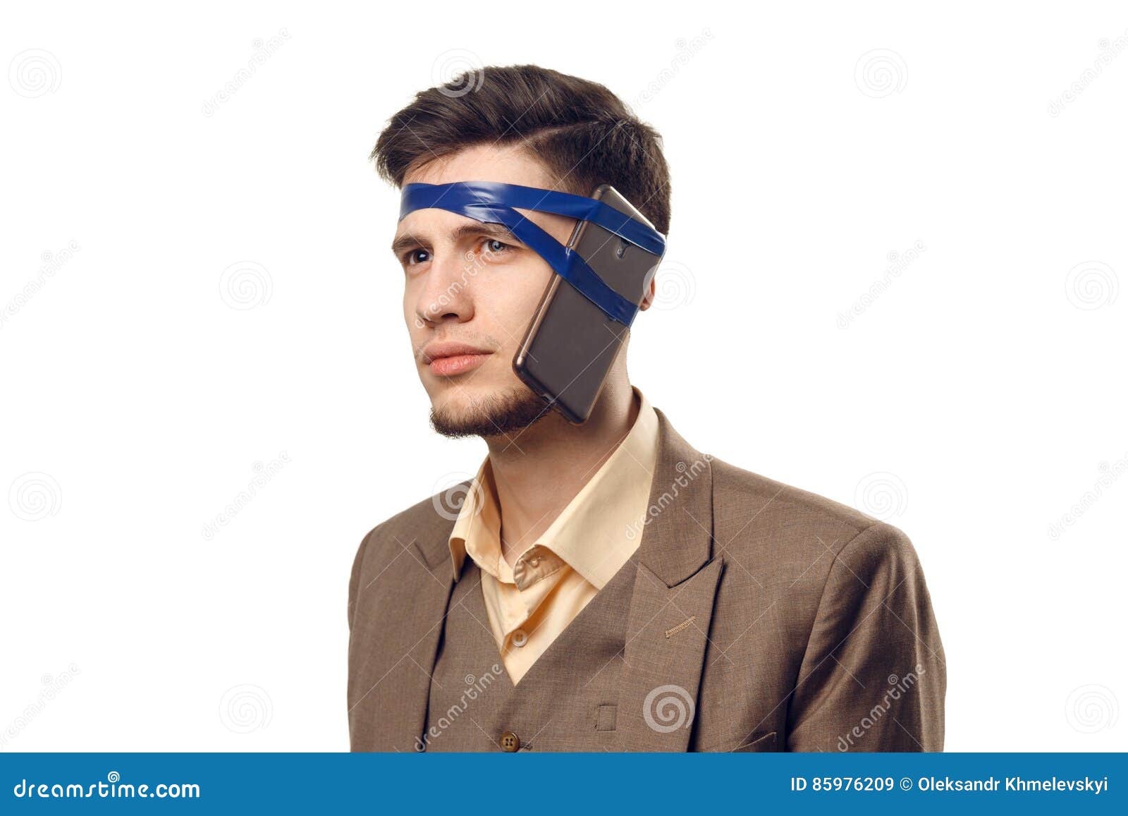 A Humorous Photo of Modern Technologies. Young Guy with a Phone ...