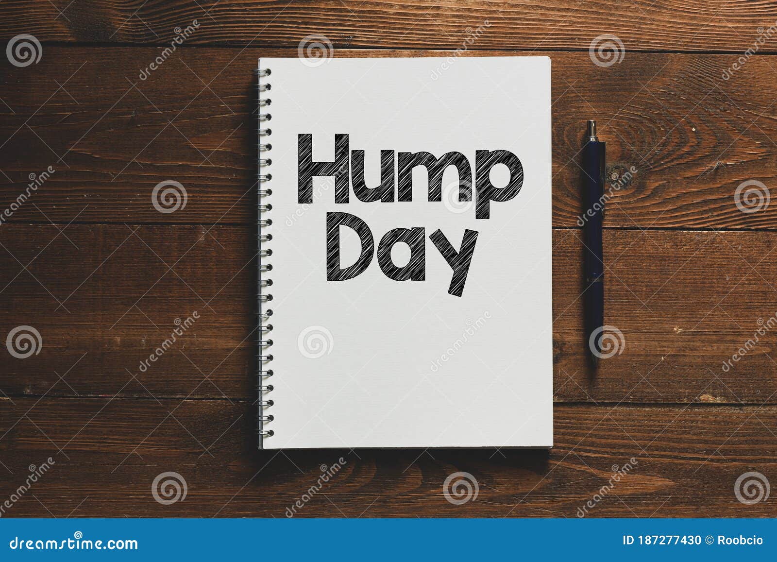 HUMP DAY Text Written in an Office Notebook on a Wooden Table Stock ...