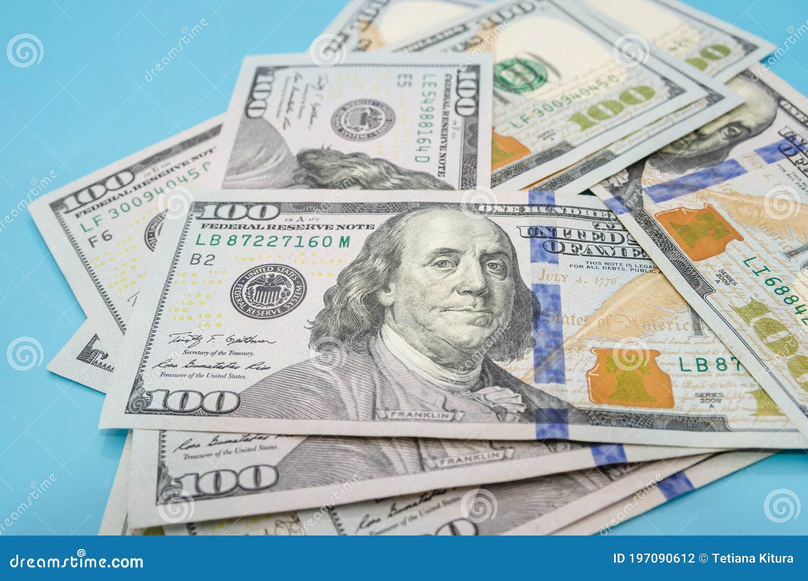 Hundred Dollar Bills on a Blue Background. Money Background. Stock ...
