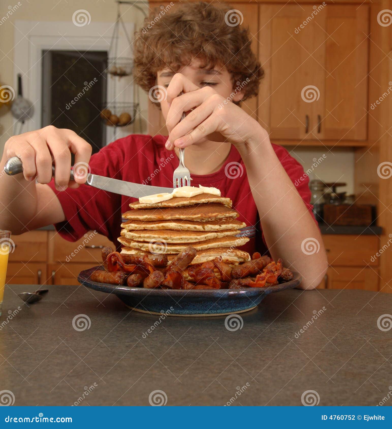 Hungry boy stock photo. Image of greedy, happy, breakfast - 4760752
