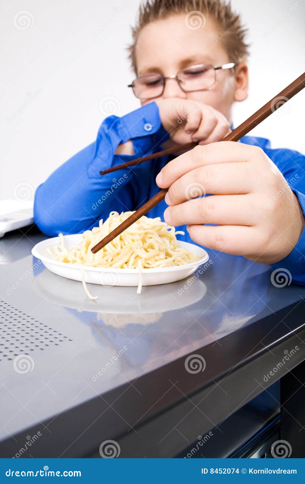 Hungry Boy Eating Chinese Noodles with Sticks Stock Photo - Image of ...