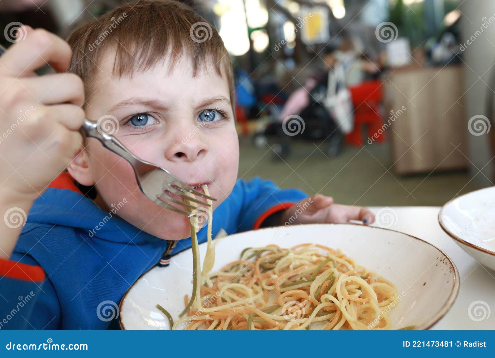 Hungry Boy Eating Spaghetti Stock Image - Image of meal, holding: 221473481