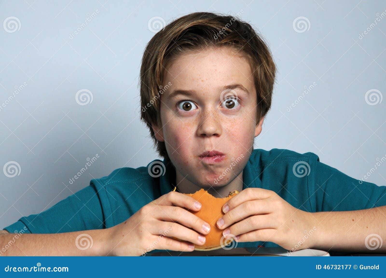 Hungry boy stock image. Image of eating, beefburger, food - 46732177
