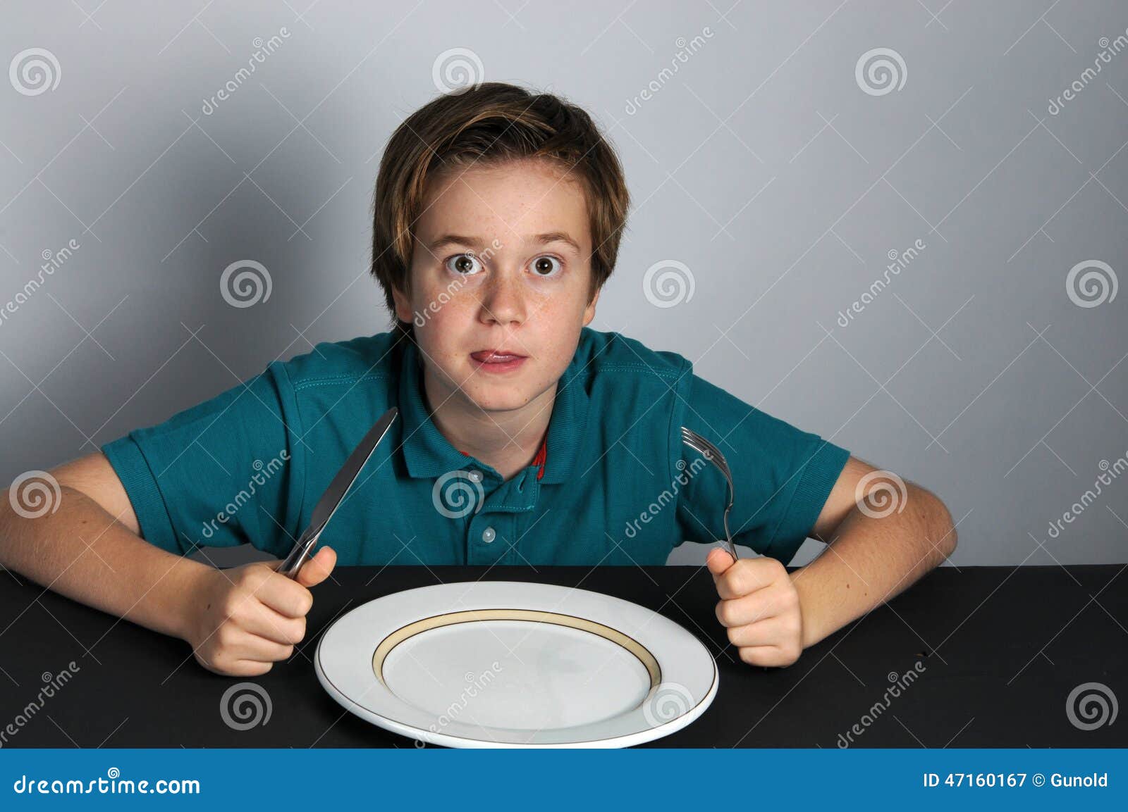 Hungry Boy Stock Photo - Image: 47160167