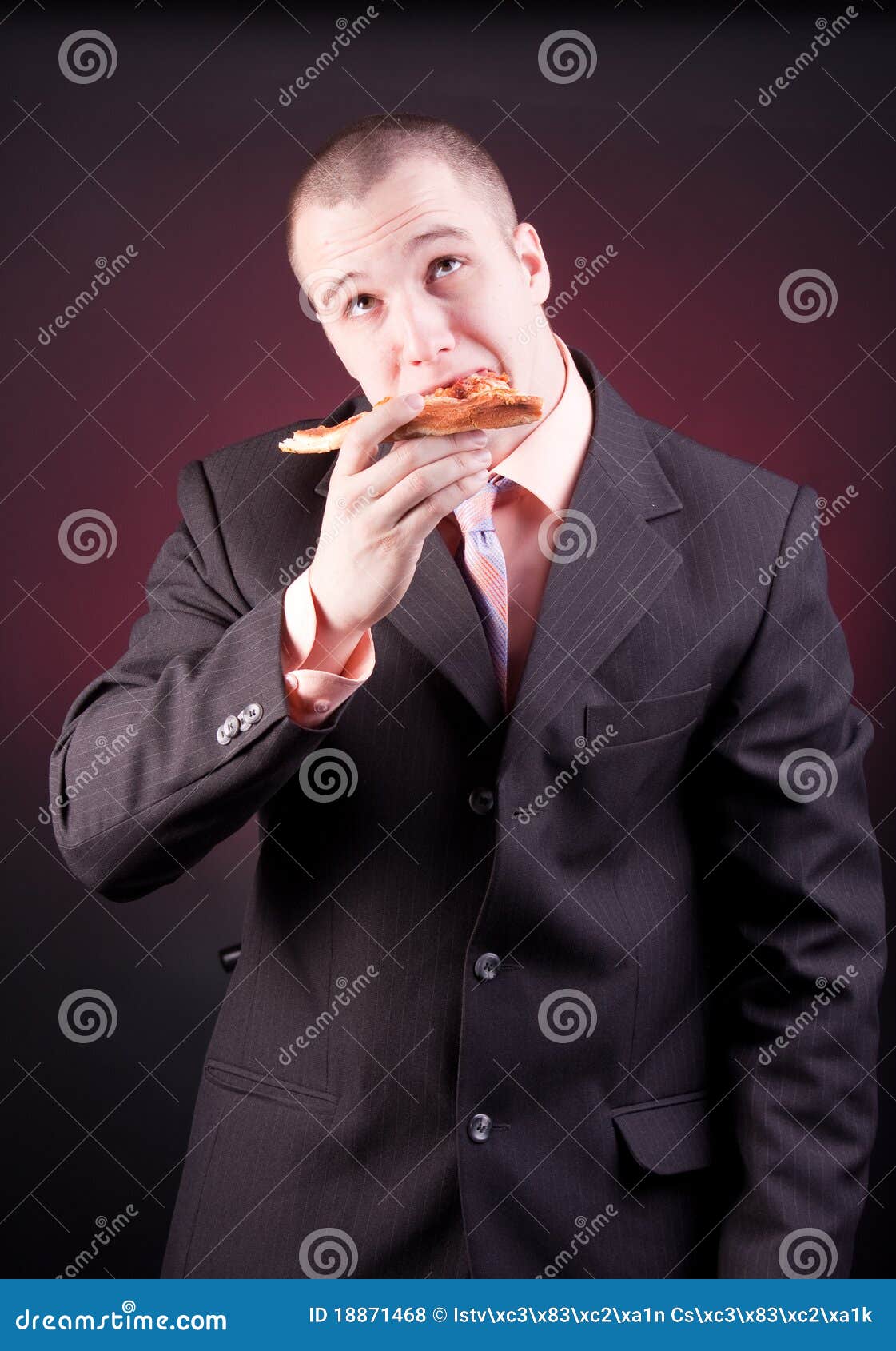 Hungry businessman stock photo. Image of executive, adult - 18871468