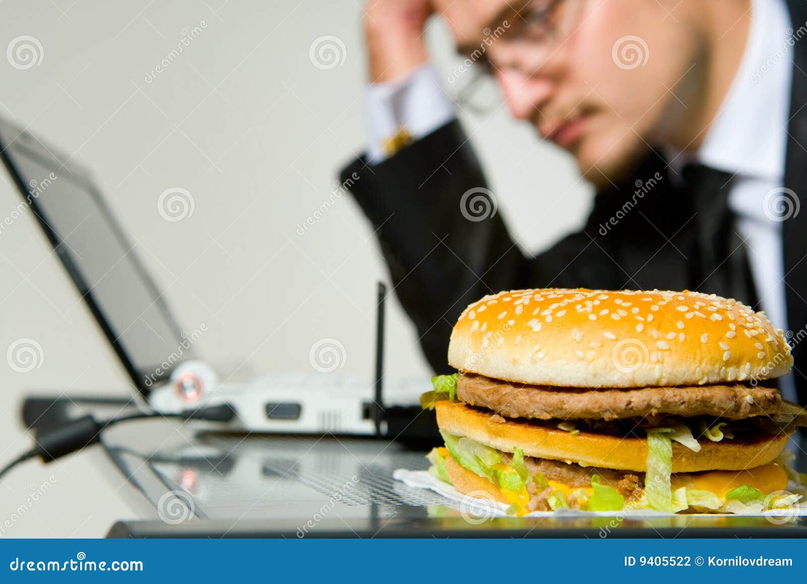Hungry Businessman Eating Hamburger Stock Photo - Image of glasses ...