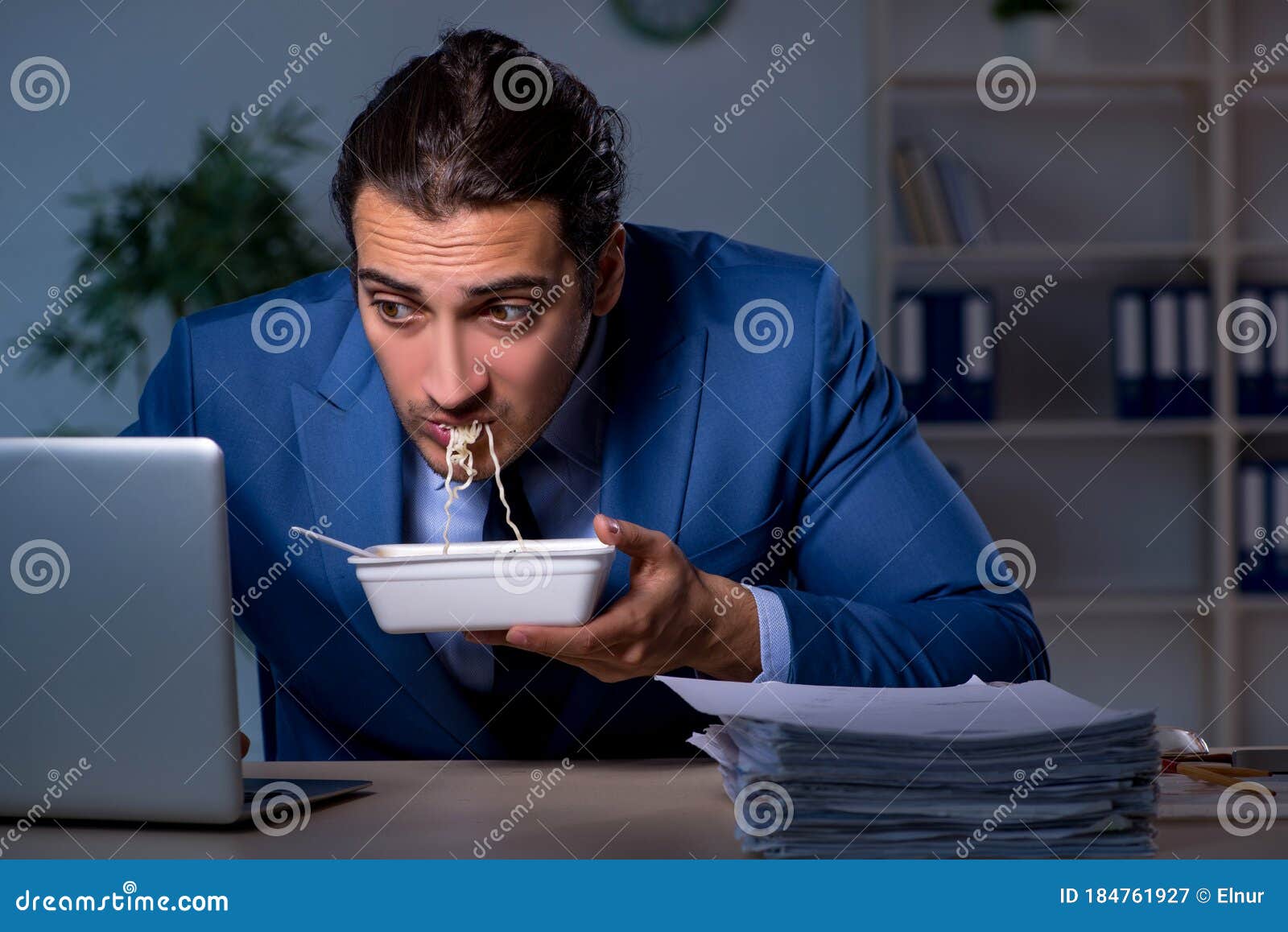 Hungry Employee Working Late in the Office Stock Image - Image of ...