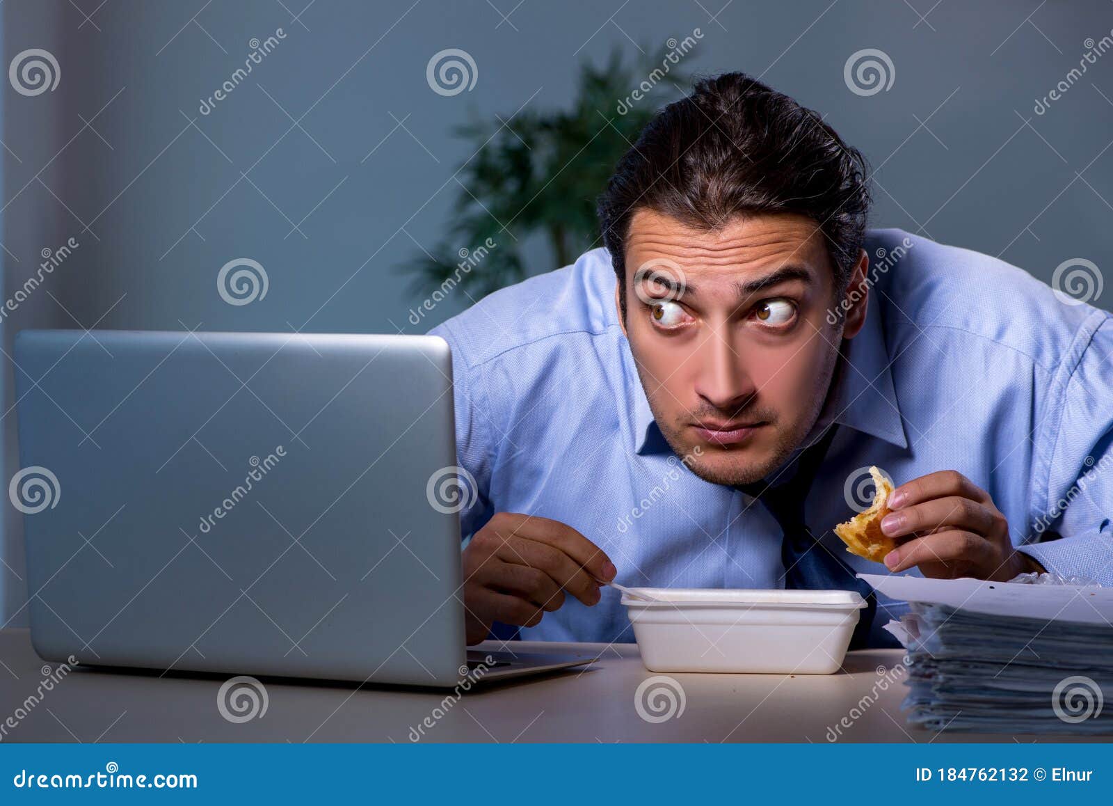 Hungry Employee Working Late in the Office Stock Photo - Image of ...