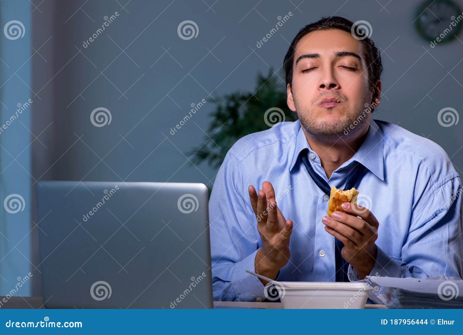 Hungry Employee Working Late in the Office Stock Photo - Image of ...