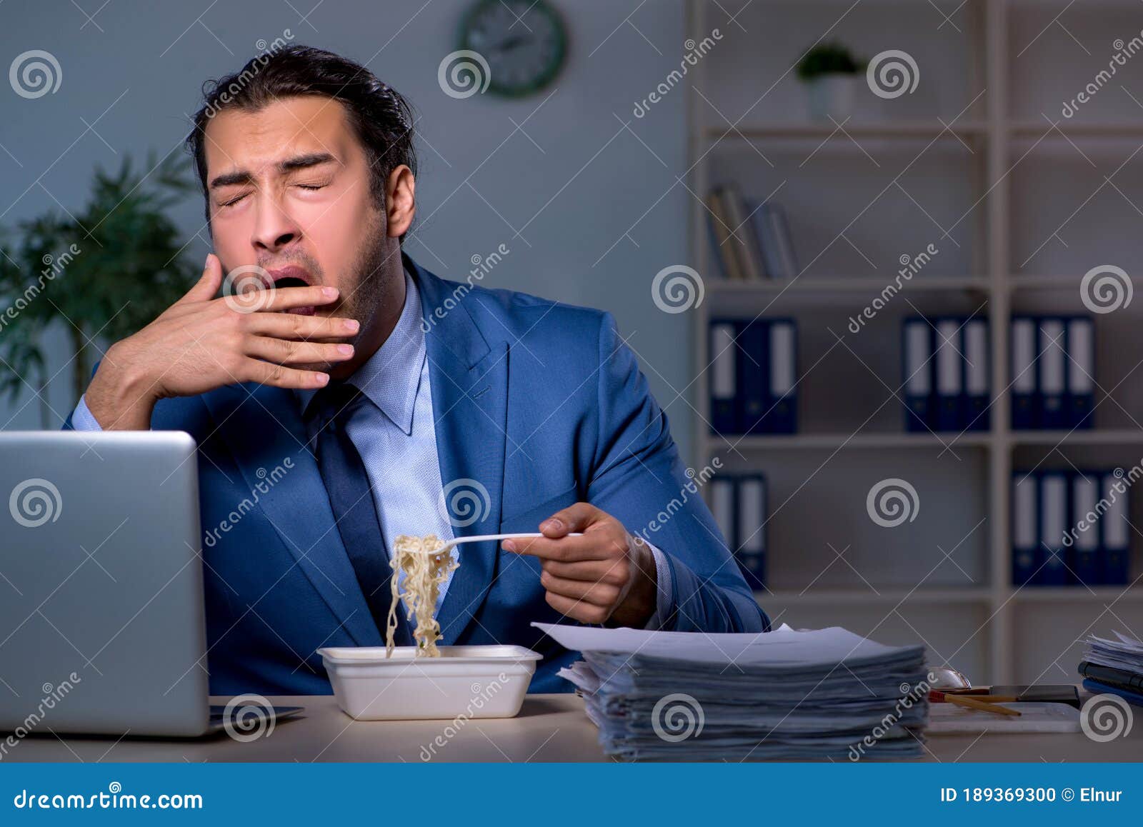 Hungry Employee Working Late in the Office Stock Photo - Image of ...