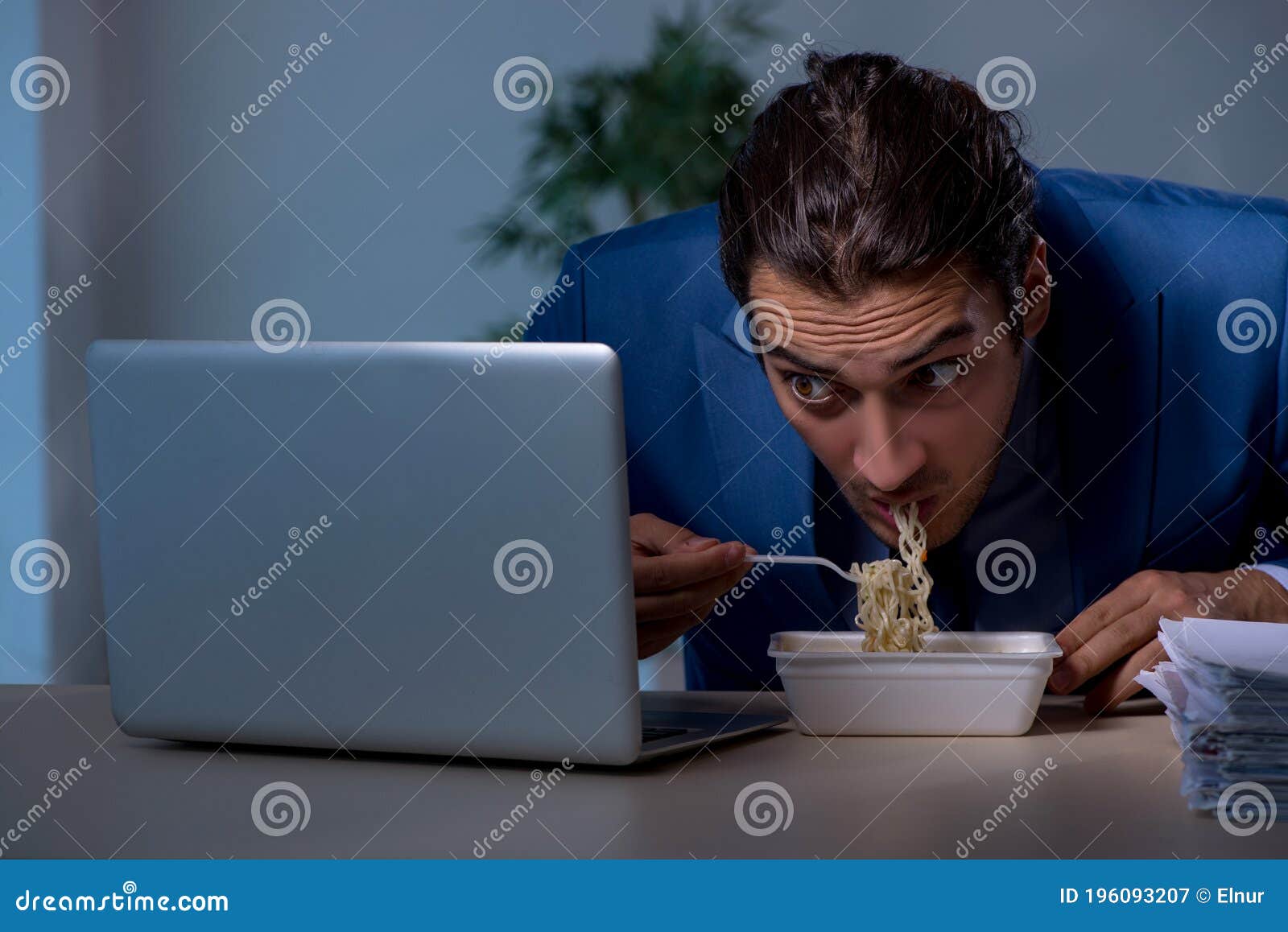 Hungry Employee Working Late in the Office Stock Image - Image of ...