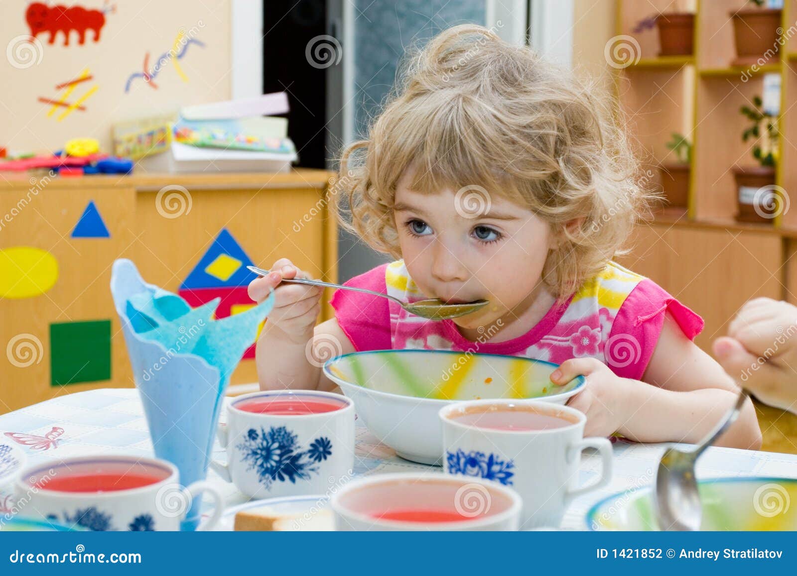 Hungry girl. stock photo. Image of smile, homework, colors - 1421852