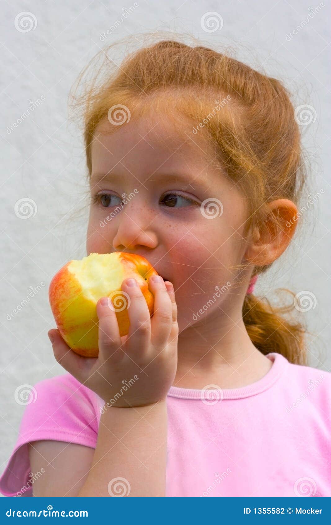 Hungry Girl with Apple Eating Stock Photo - Image of bite, natural: 1355582