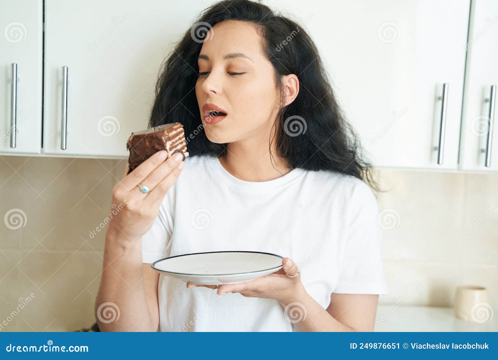 Hungry Lady Eating Tasty Dessert In Kitchen Stock Image Image Of
