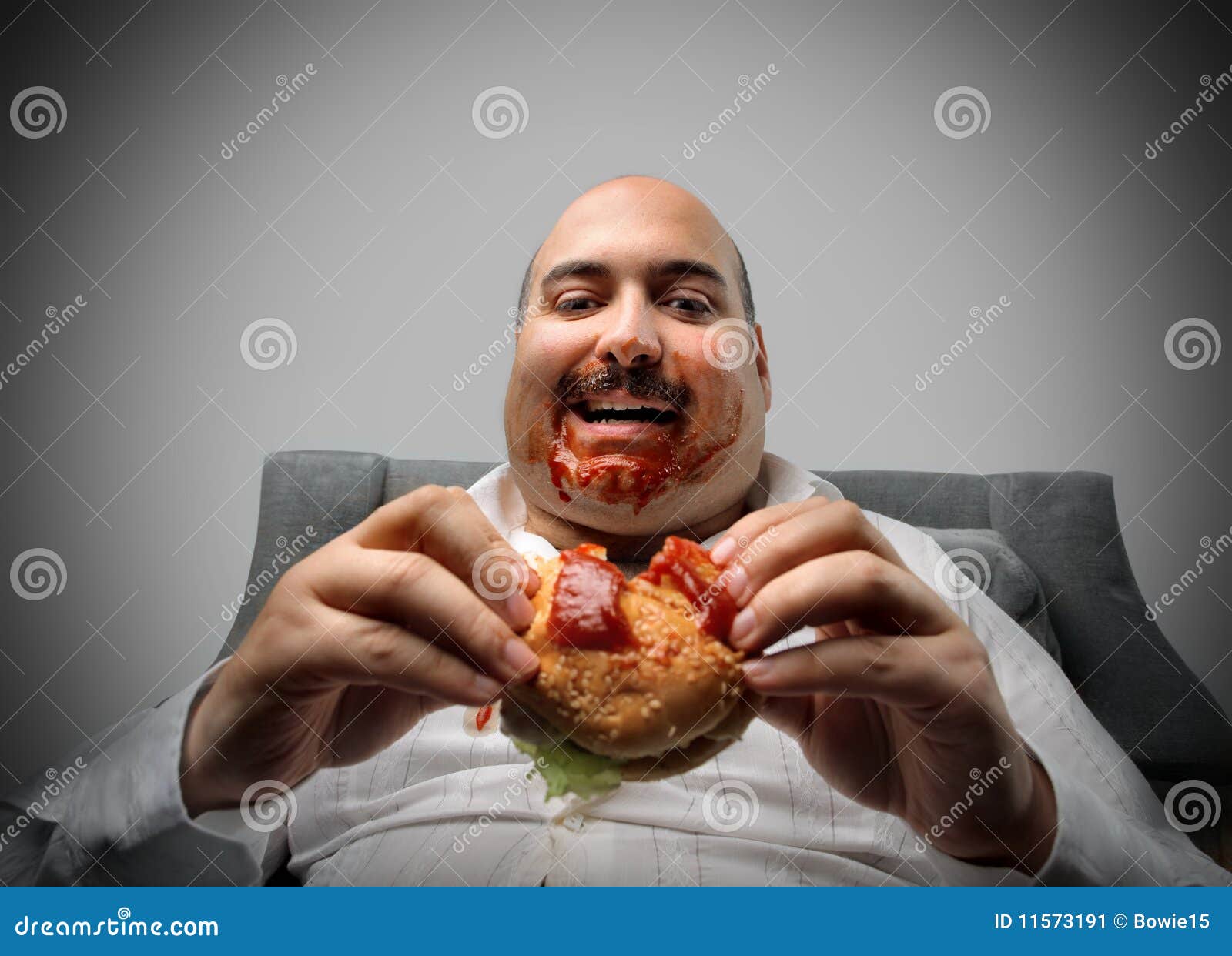 Hungry man stock image. Image of sandwich, smile, armchair - 11573191