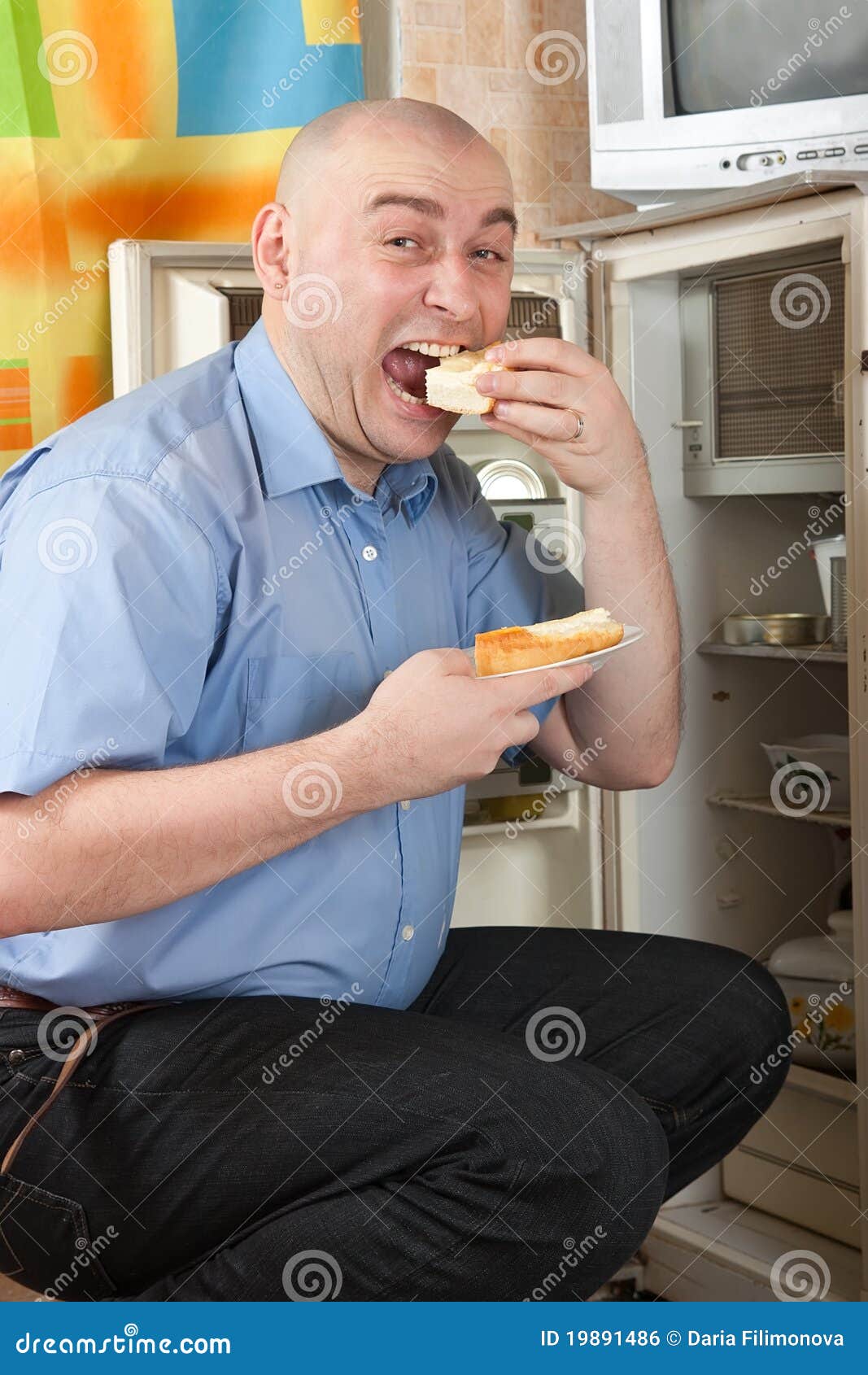 Hungry man stock photo. Image of eating, male, domestic - 19891486