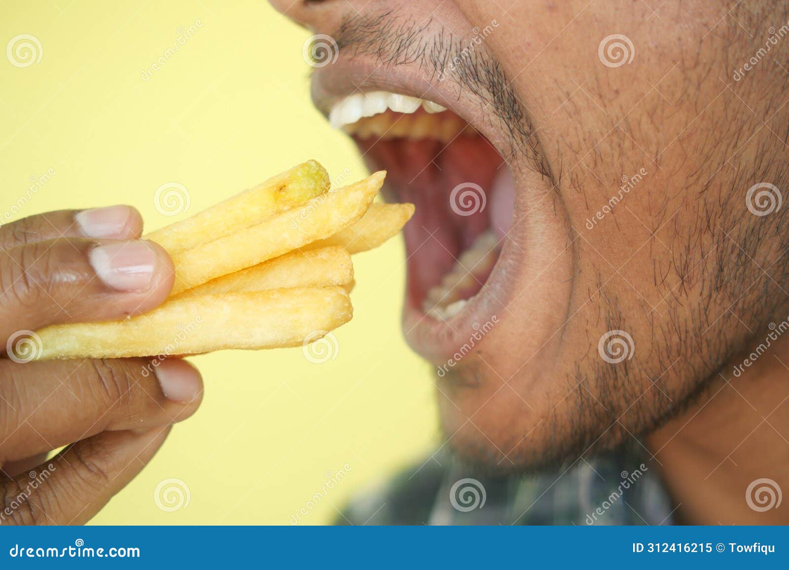 Hungry Man Eating Fries Closeup Stock Image - Image of temperature ...