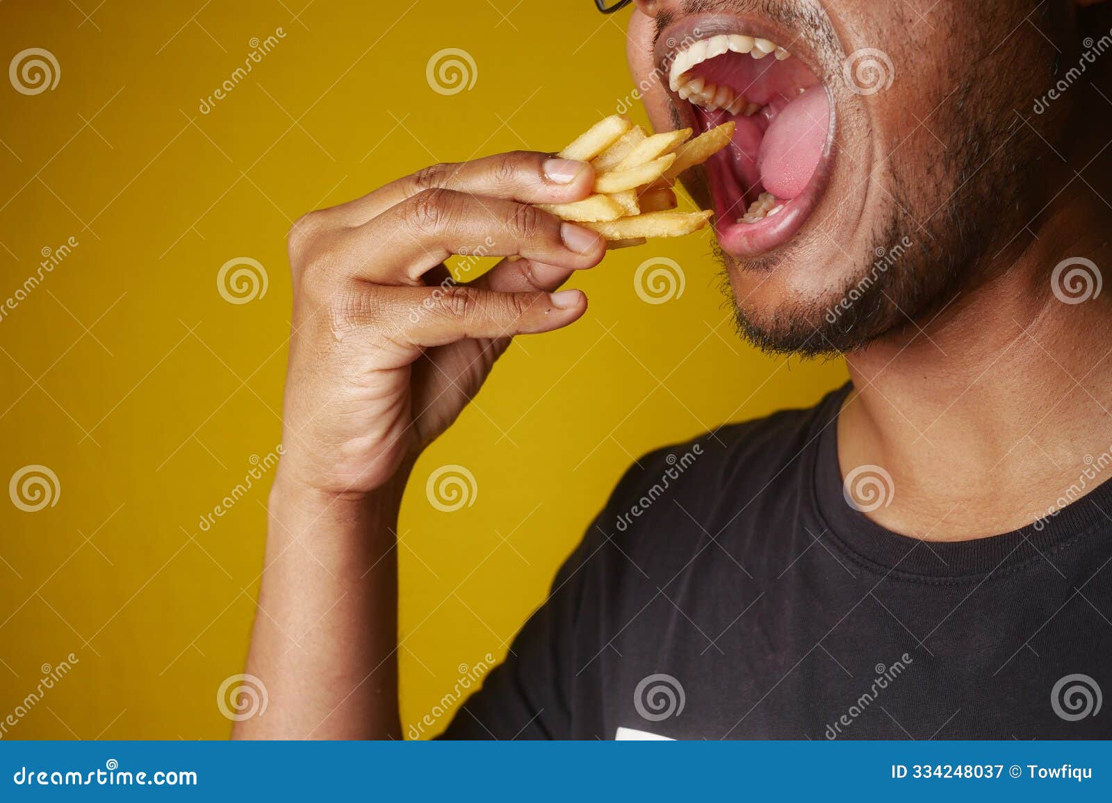 Hungry Man Eating Fries Closeup Stock Image - Image of head, smiling ...