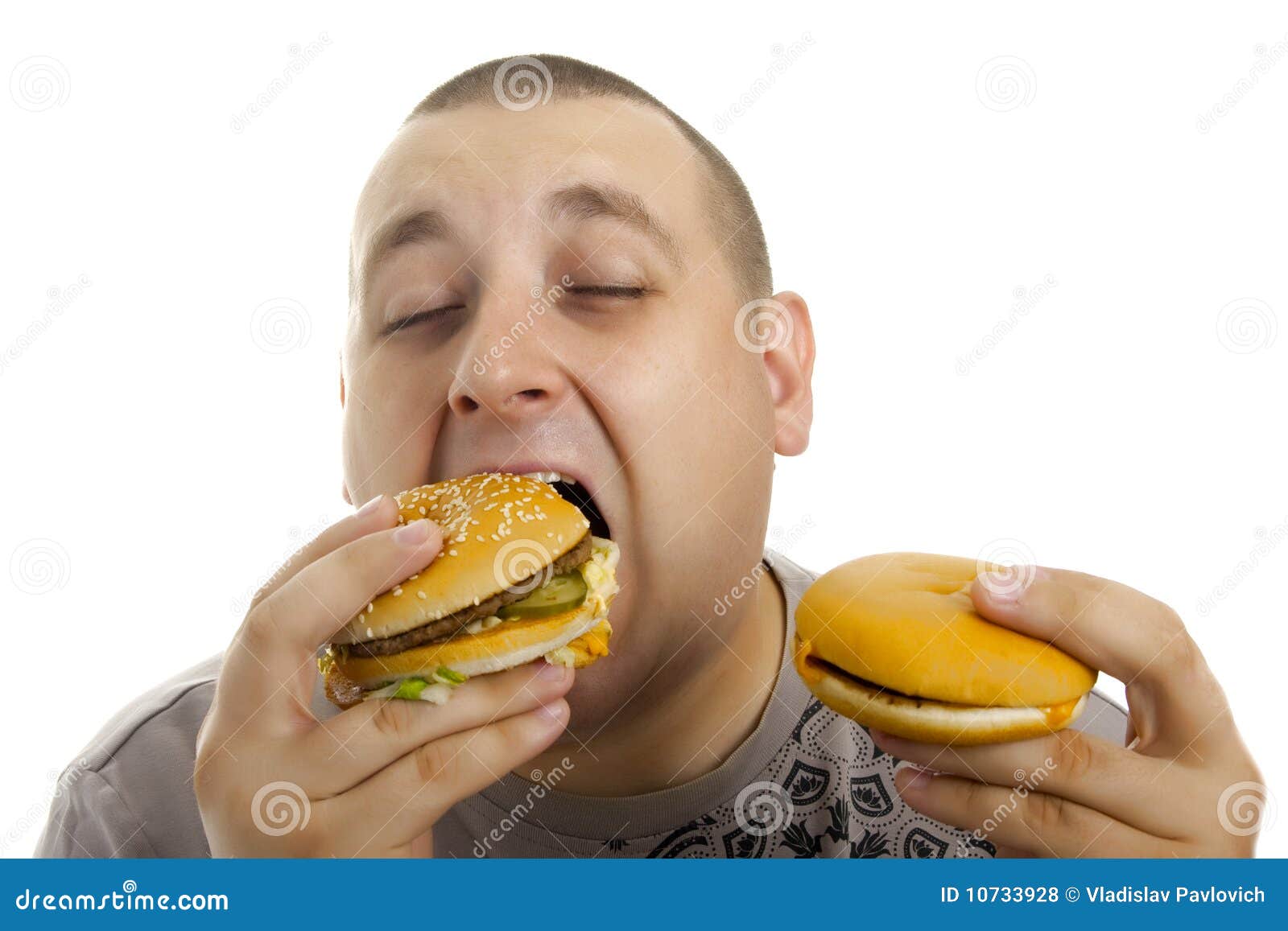 Hungry man with hamburger. stock photo. Image of person - 10733928