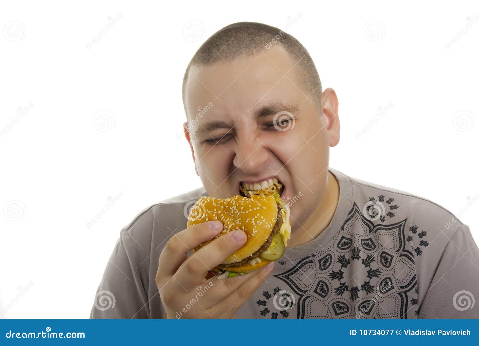 Hungry Man With Hamburger. Royalty Free Stock Photography - Image: 10734077