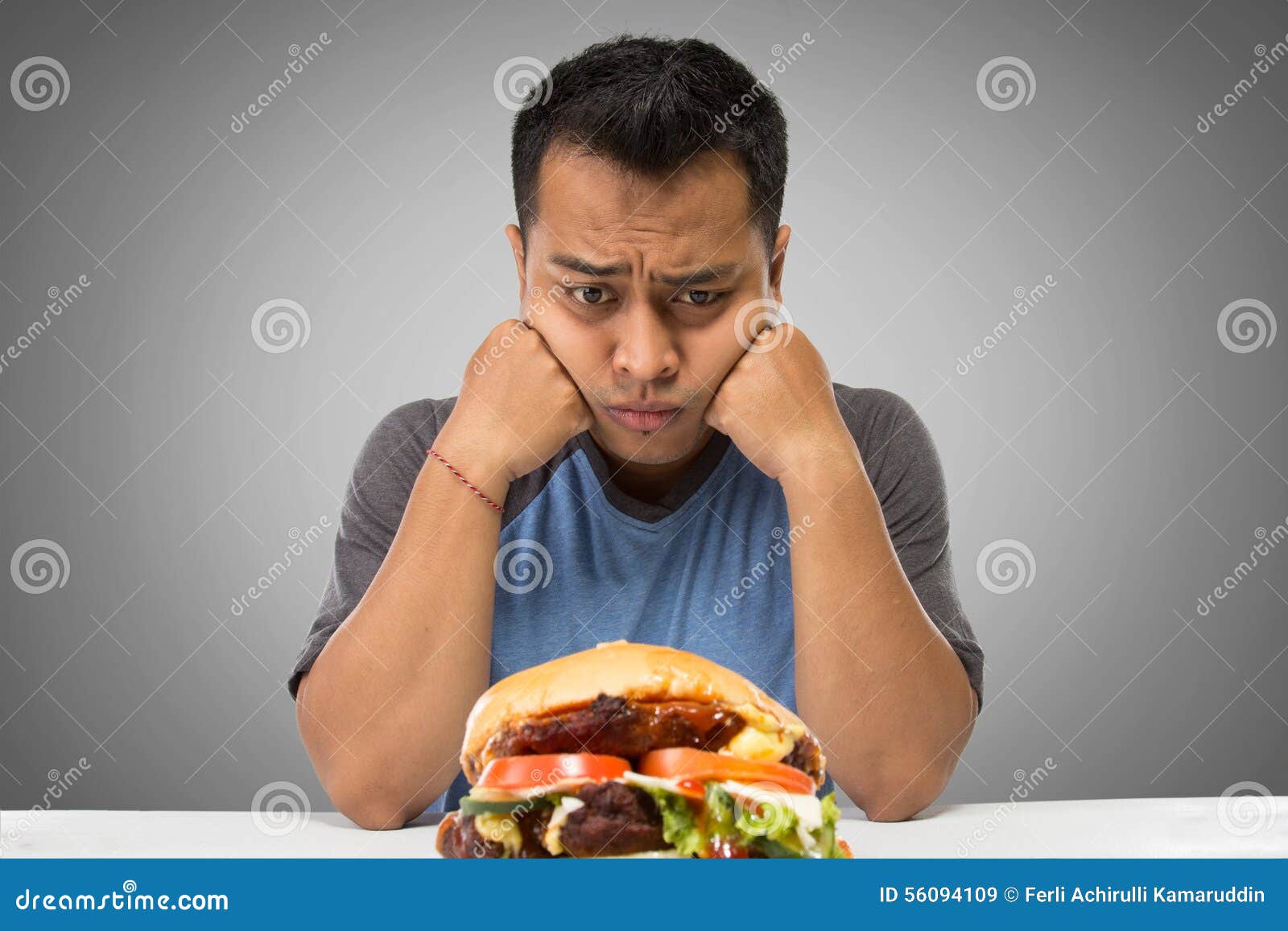 Hungry Man Looking at Big Hamburger Stock Image - Image of lunch ...