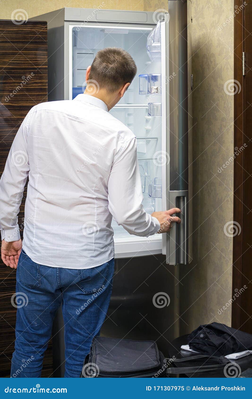Hungry Man Looks into an Empty Refrigerator Stock Image - Image of ...