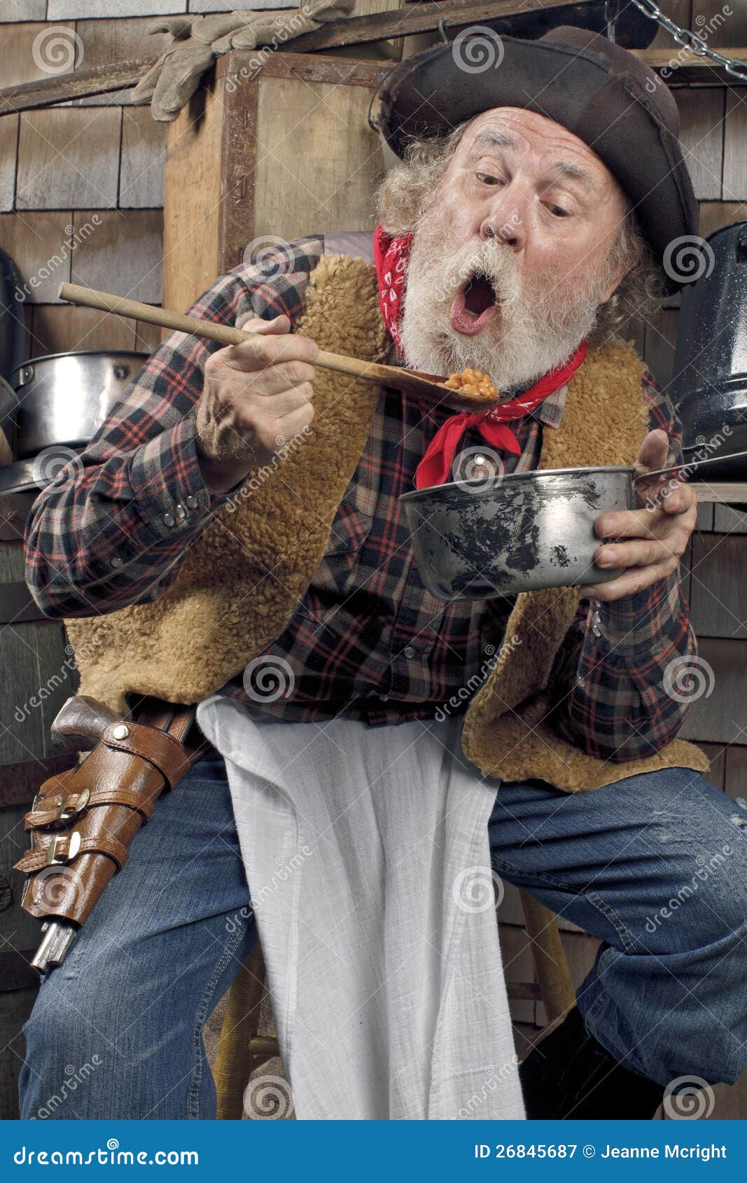 Hungry Old Cowboy Eating Beans from a Saucepan Stock Image - Image of ...