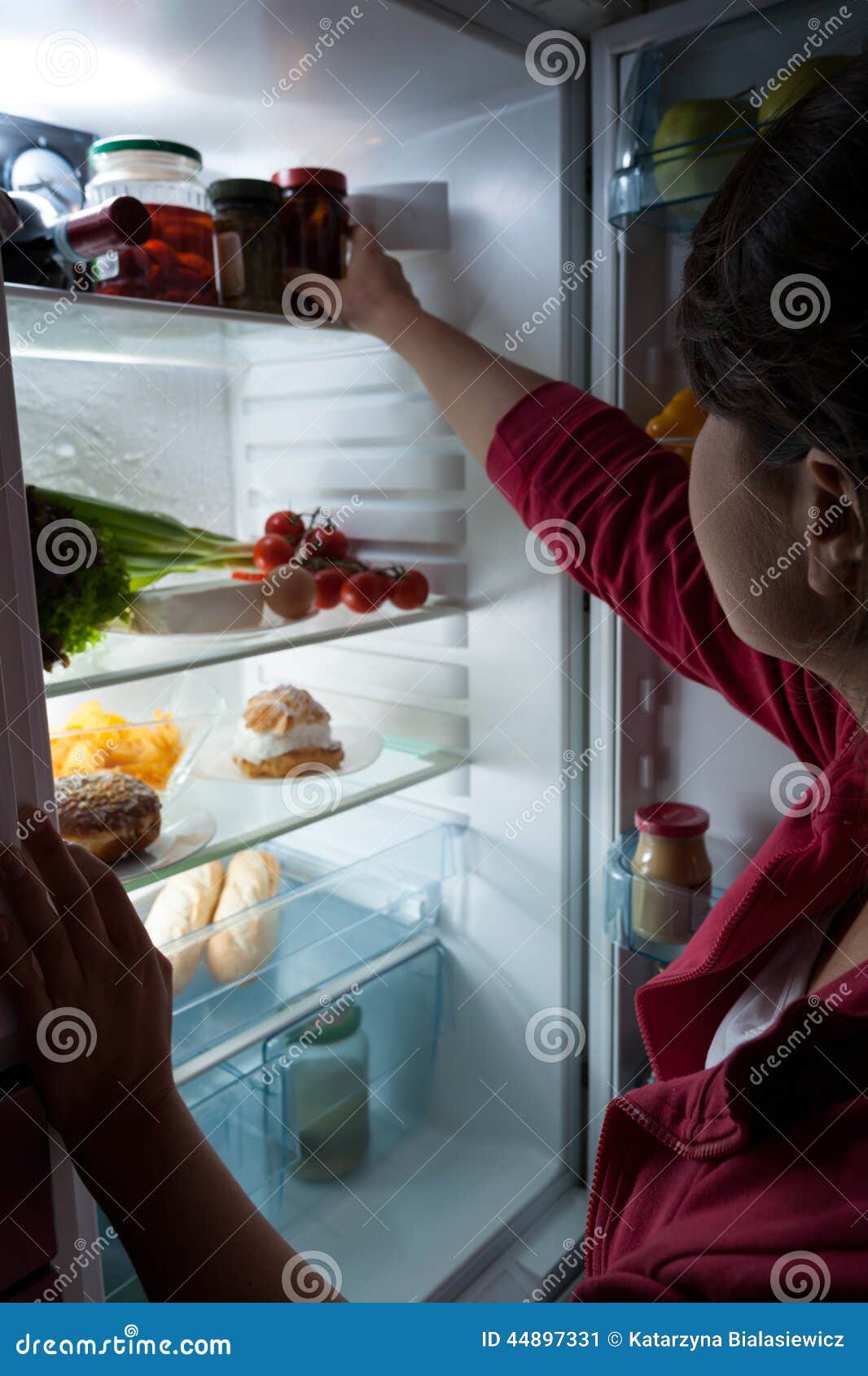 Hungry woman choosing food stock image. Image of indoor - 44897331