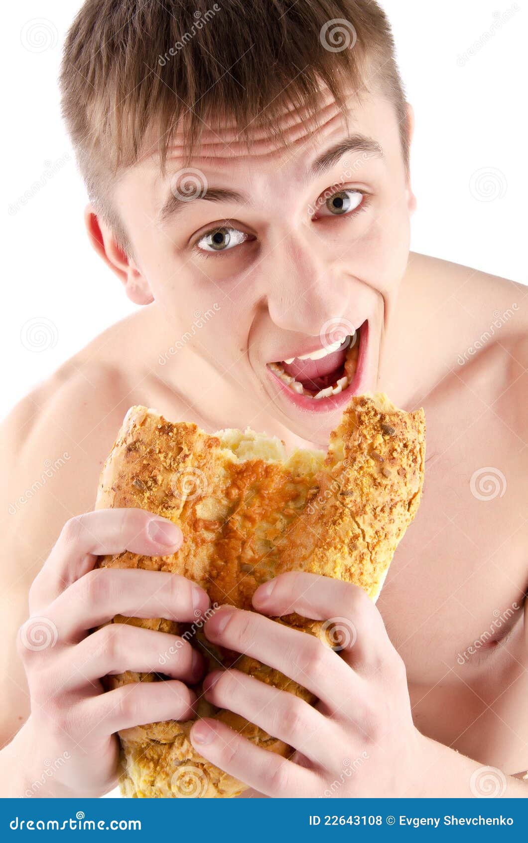 Hungry Young Man Eating Bread Stock Photo - Image of food, happy: 22643108