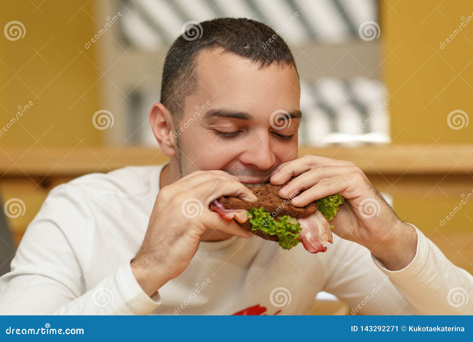 Hungry Young Man in Resaurant Eat Sandwich Stock Image - Image of ...