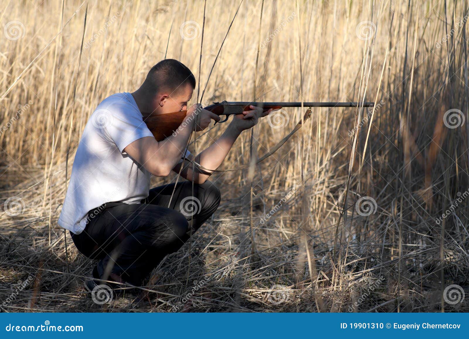 Hunter stock photo. Image of fowler, ammunition, rifle - 19901310