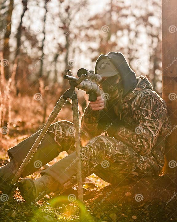 Hunter Aiming His Gun at the Prey. Stock Image - Image of camouflage ...