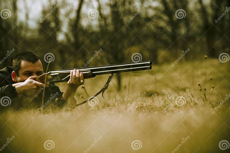 Hunter Aiming Shotgun stock image. Image of sight, focusing - 2157923