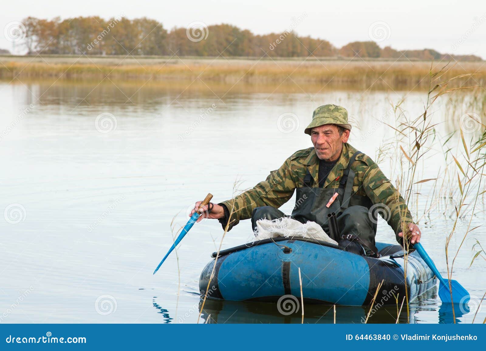 Hunter in a boat stock photo. Image of duck, season, hunting - 64463840