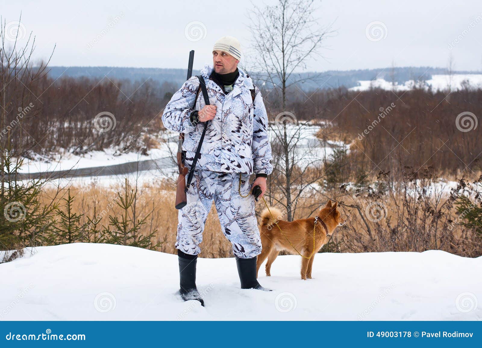 Hunter with dog in winter stock photo. Image of outdoors - 49003178