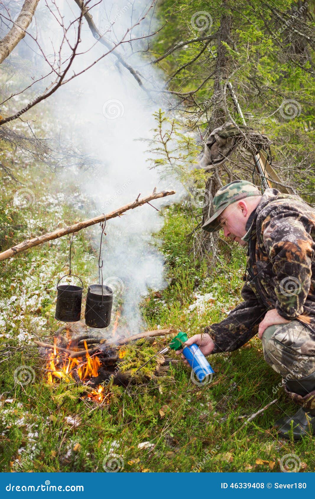 Hunter in Forest Fire Ignites Stock Photo - Image of fire, outdoor ...