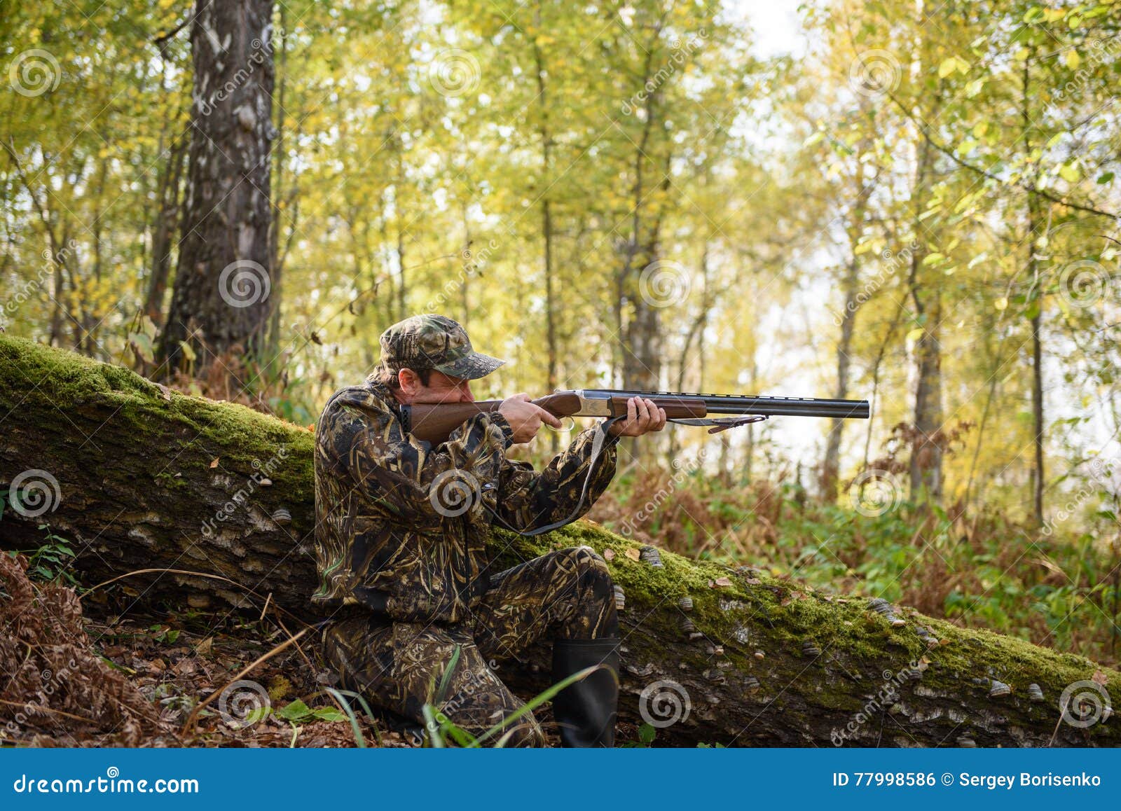 Hunter with a Gun in the Autumn Woods Stock Photo - Image of pursuit ...