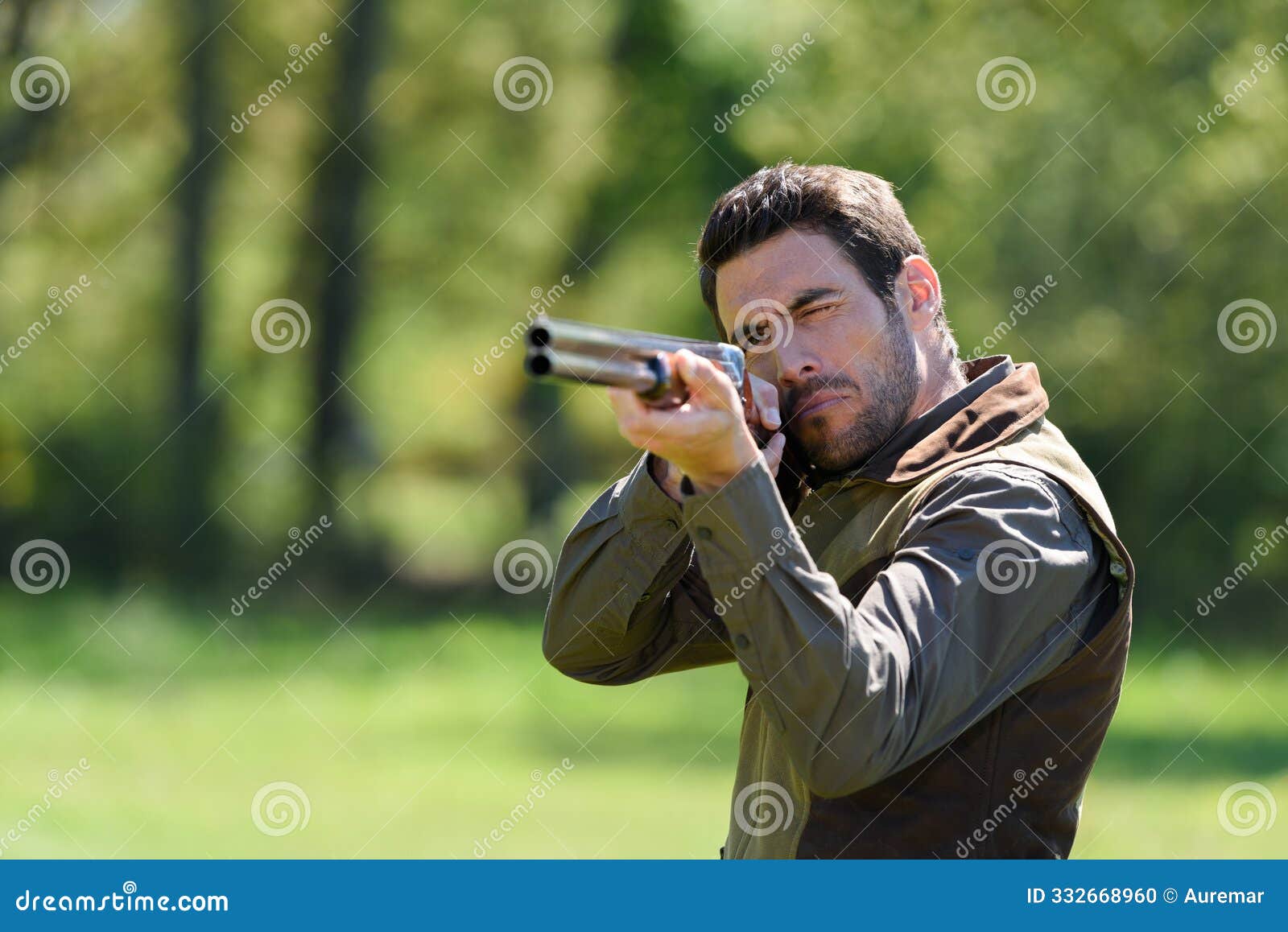 Hunter with gun on forest stock photo. Image of hands - 332668960