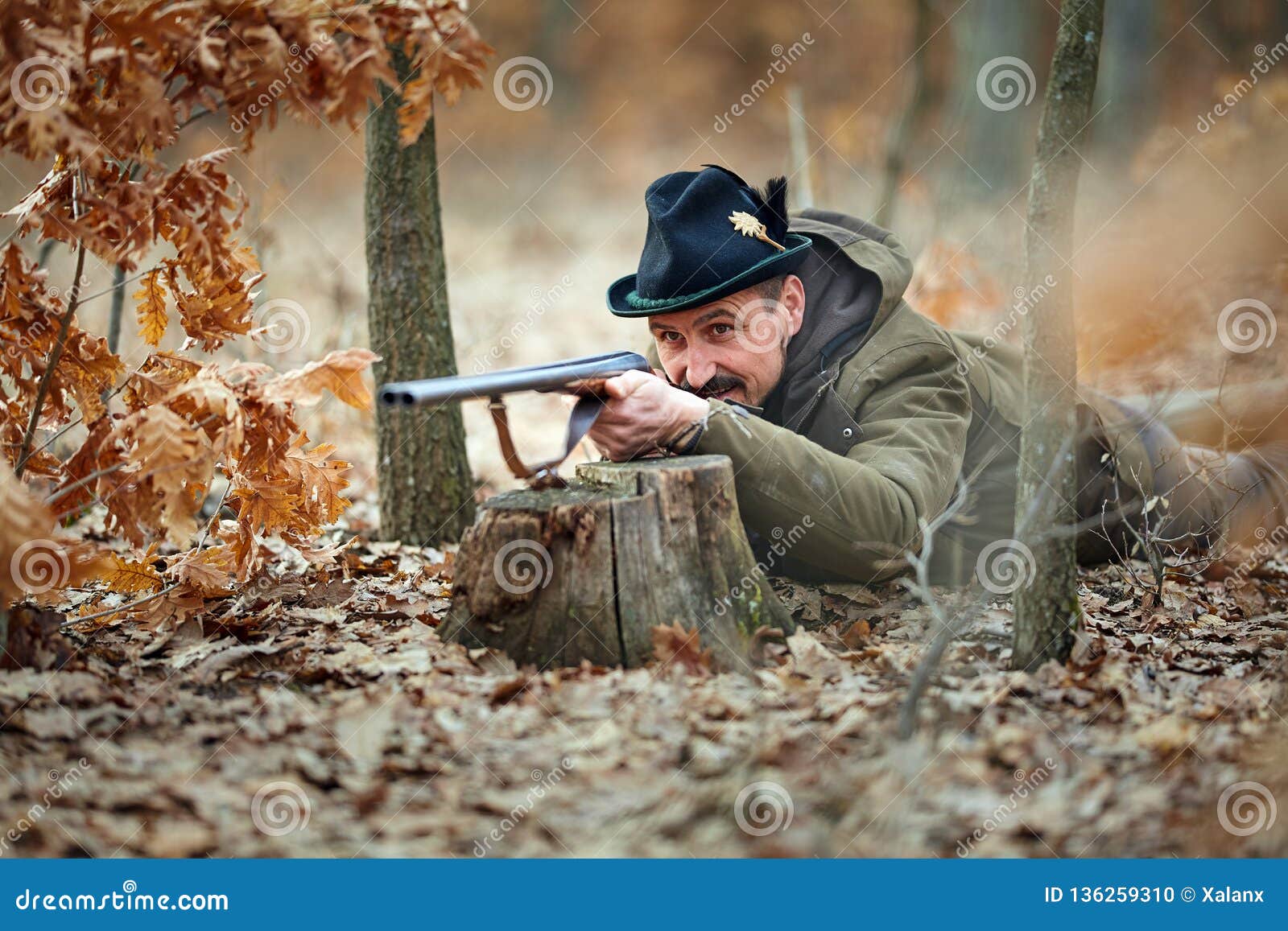 Hunter with Gun in the Forest Stock Photo - Image of nature, camouflage ...