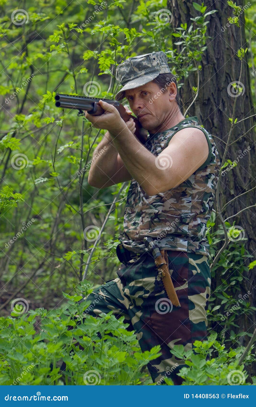 Hunter with gun in hand stock image. Image of male, season - 14408563