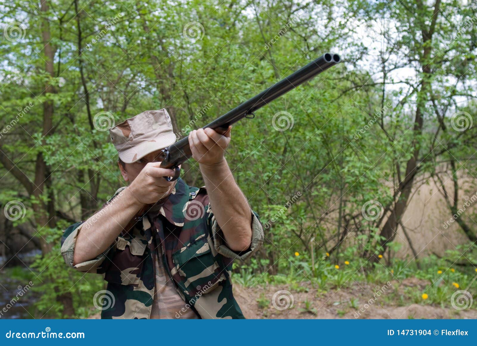 Hunter with gun in hand stock photo. Image of hunter - 14731904