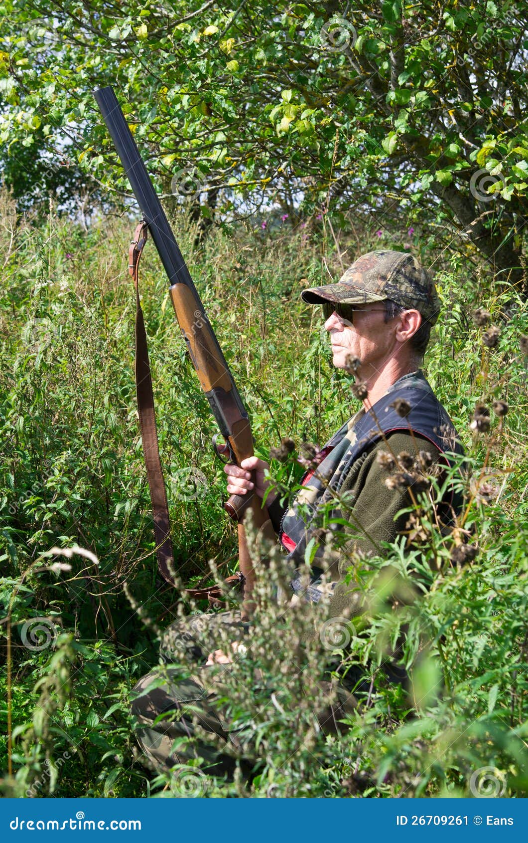 Hunter Hiding in High Grass Stock Image - Image of hunter, caucasian ...