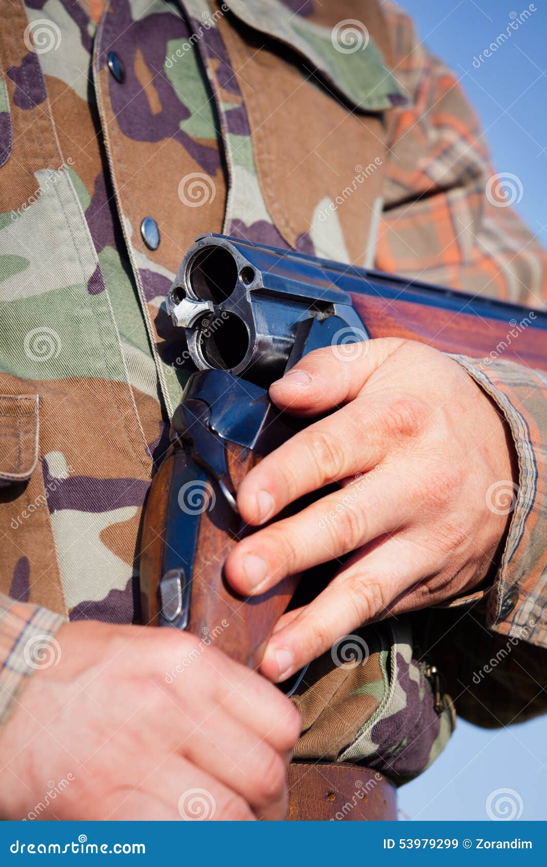 Hunter holding a rifle stock image. Image of danger, rifle - 53979299
