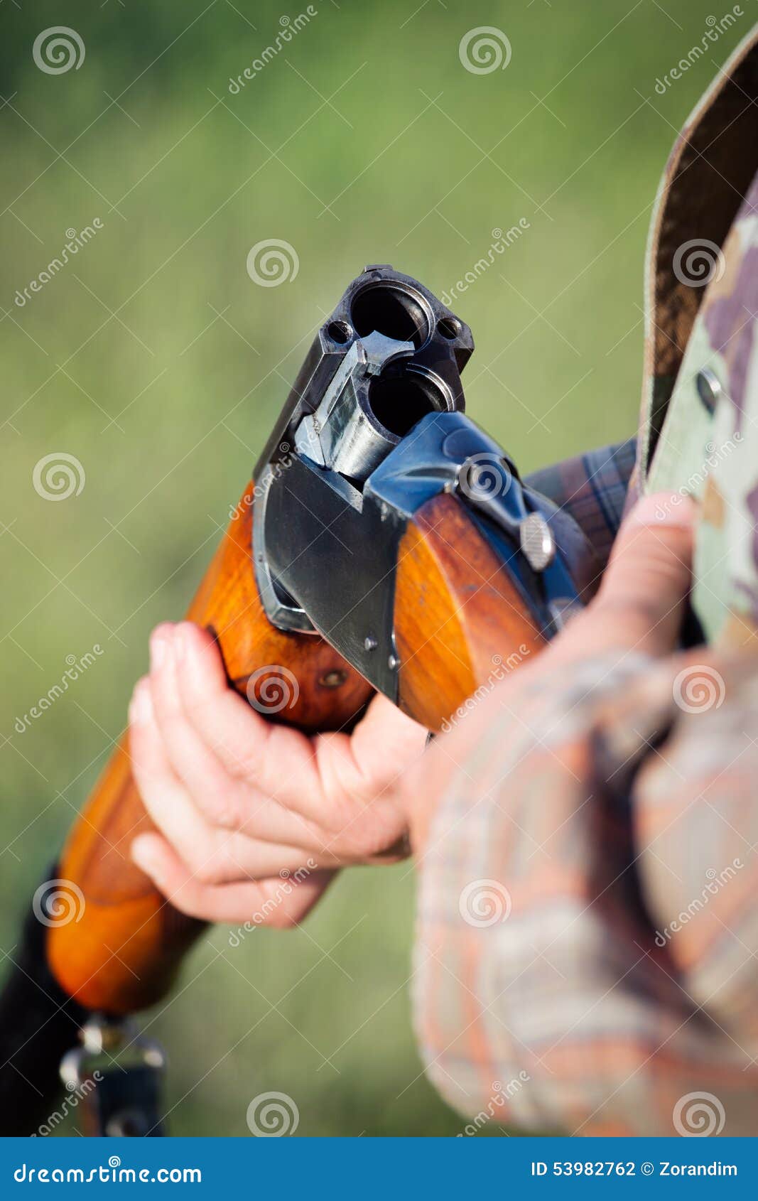 Hunter holding a rifle stock photo. Image of closeup - 53982762