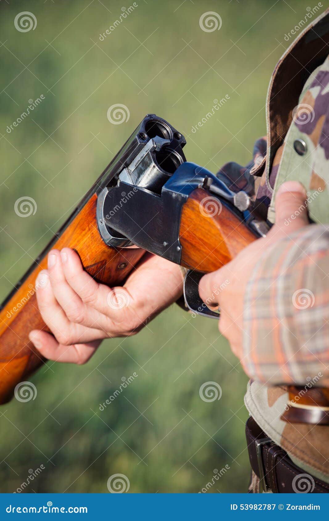 Hunter holding a rifle stock image. Image of activity - 53982787